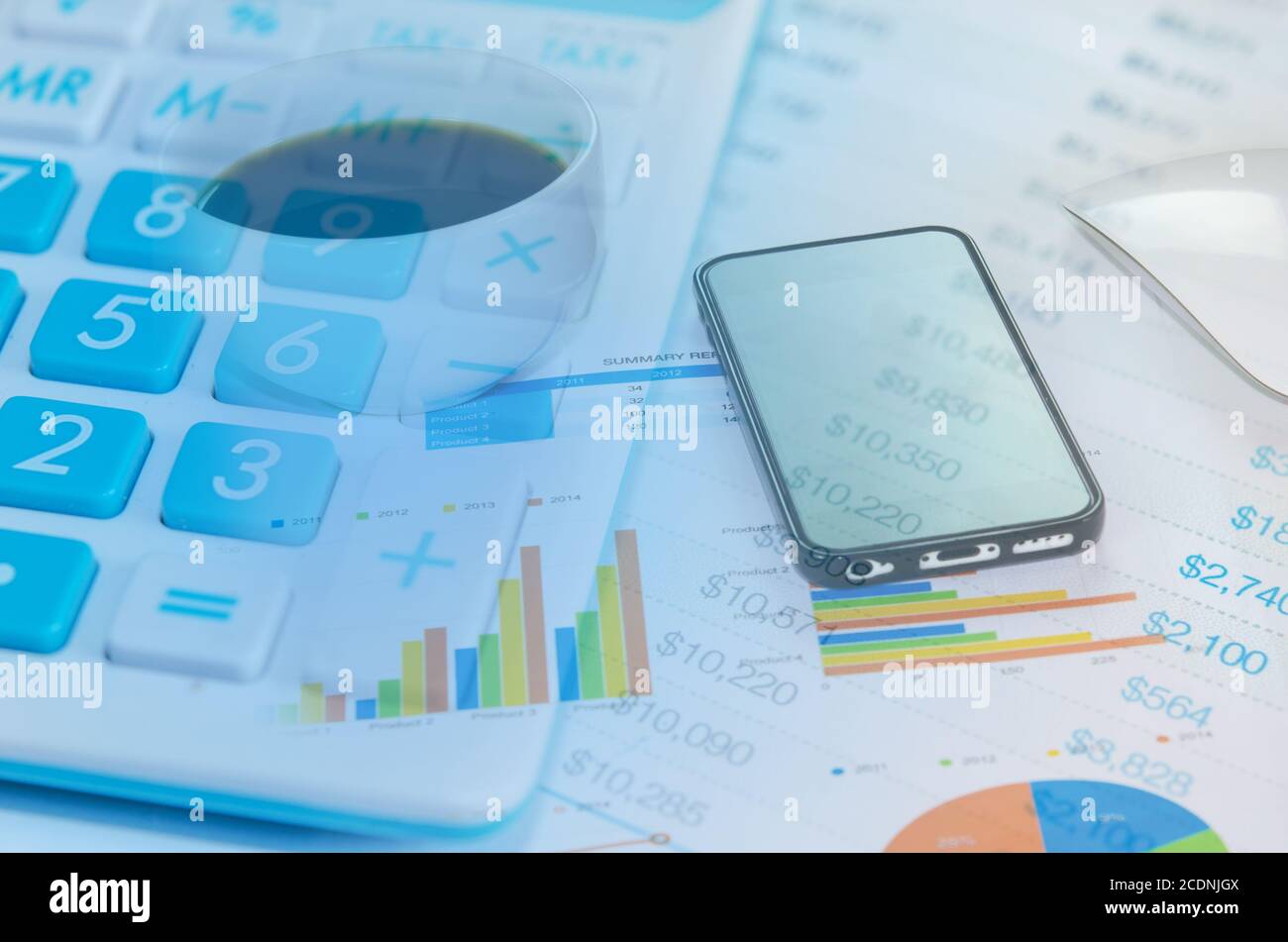 Calculators and Financial Statements Stock Photo - Alamy