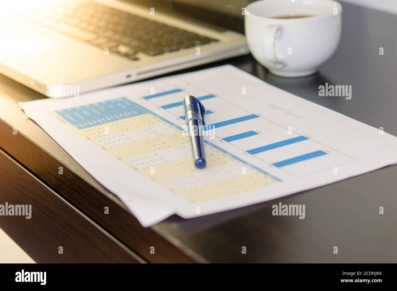 Graphs and pen Stock Photo - Alamy