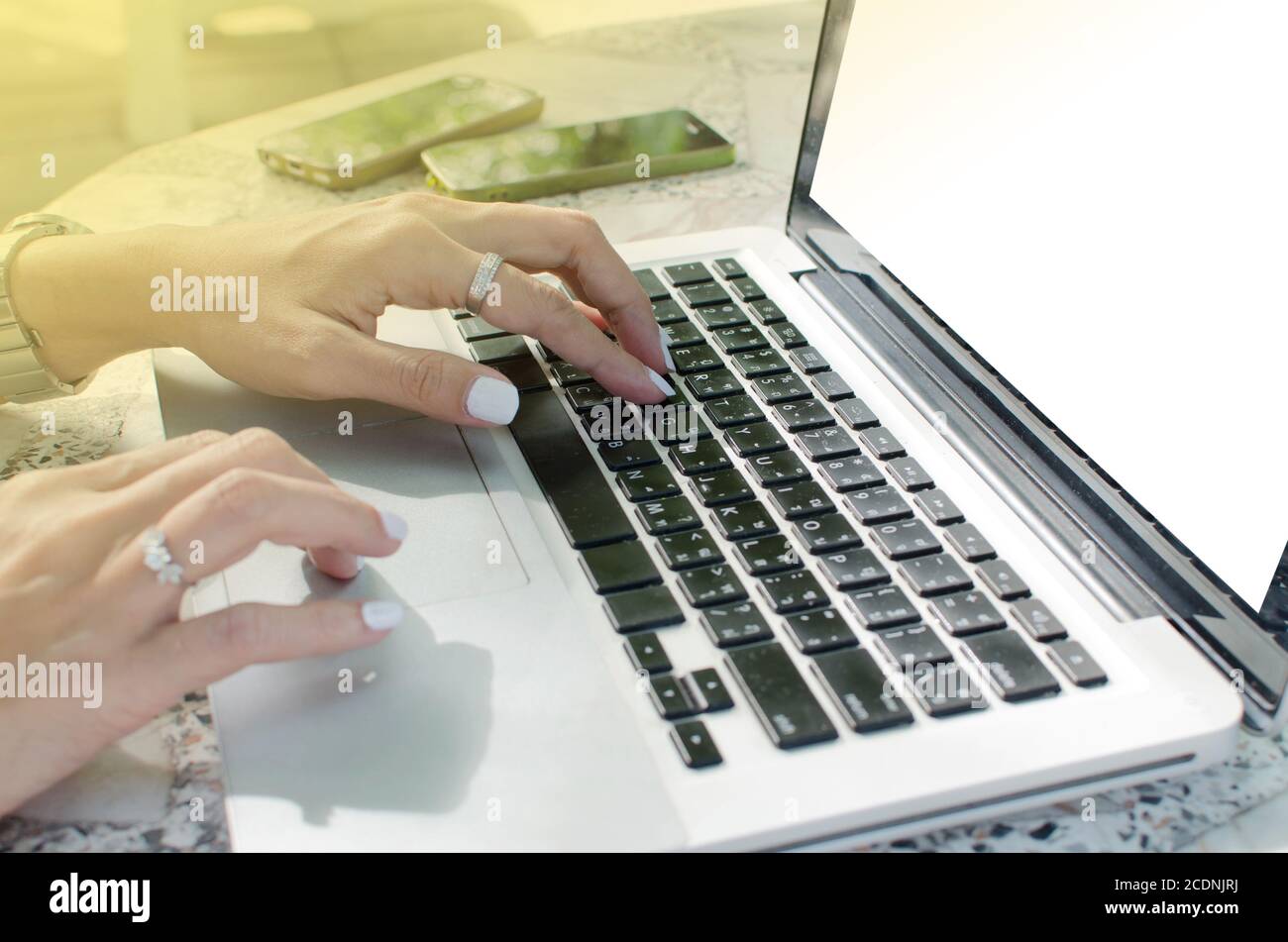 laptop computer and hand Stock Photo - Alamy