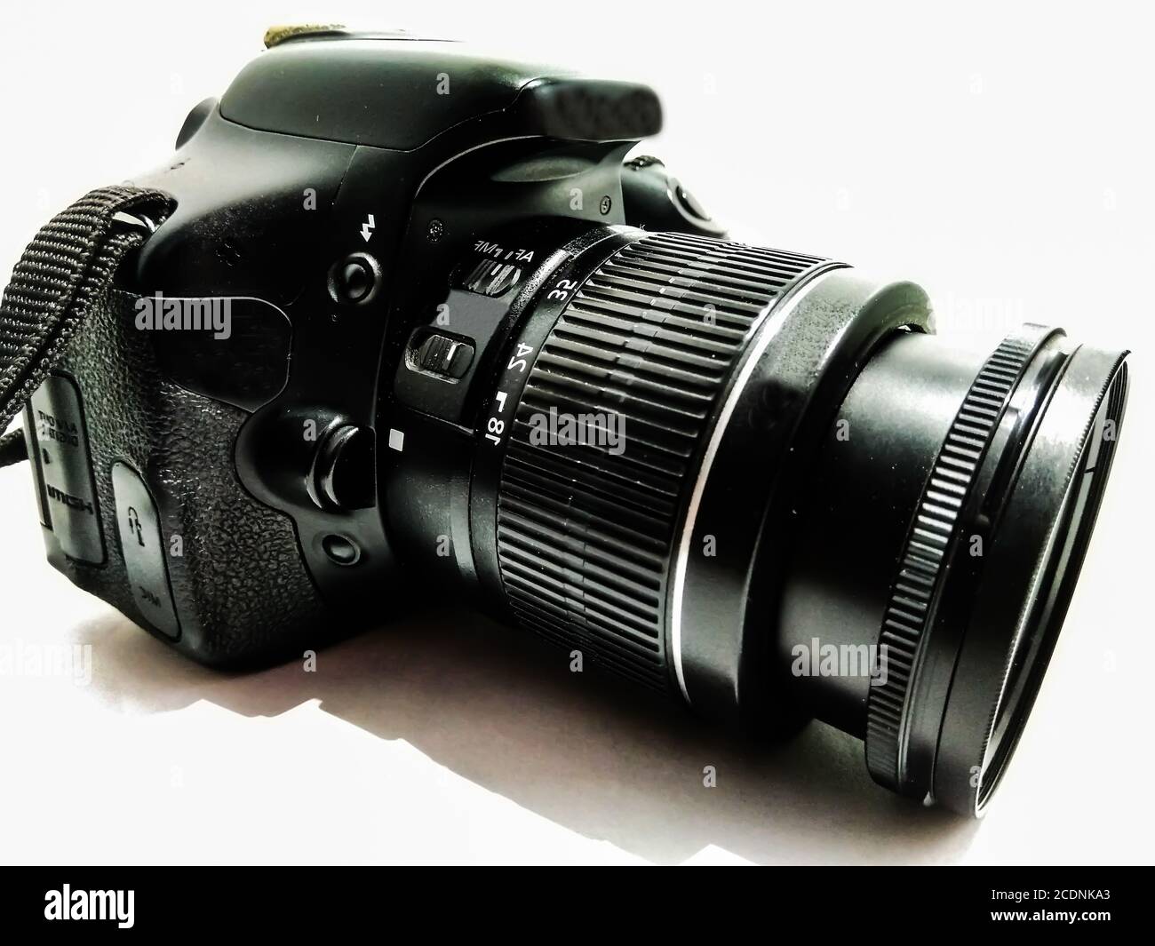 A picture of dslr on white background Stock Photo - Alamy