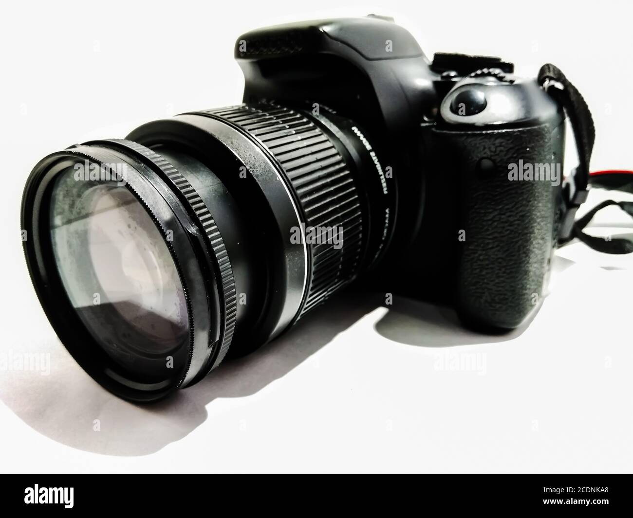 A picture of dslr on white background Stock Photo - Alamy