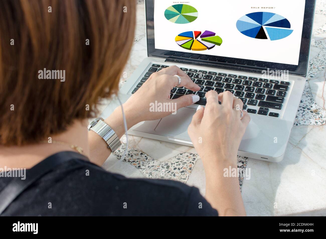 graphs and laptop Stock Photo - Alamy