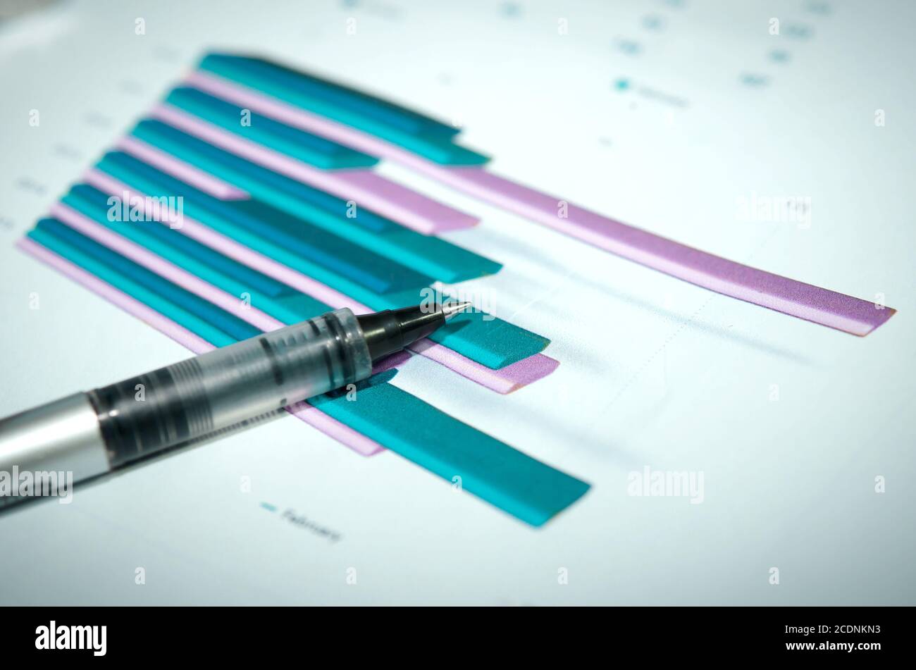 Graphs and pen Stock Photo - Alamy