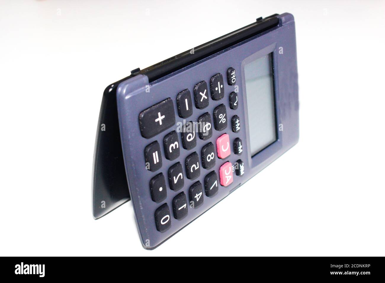 A picture of calculator on white background Stock Photo - Alamy