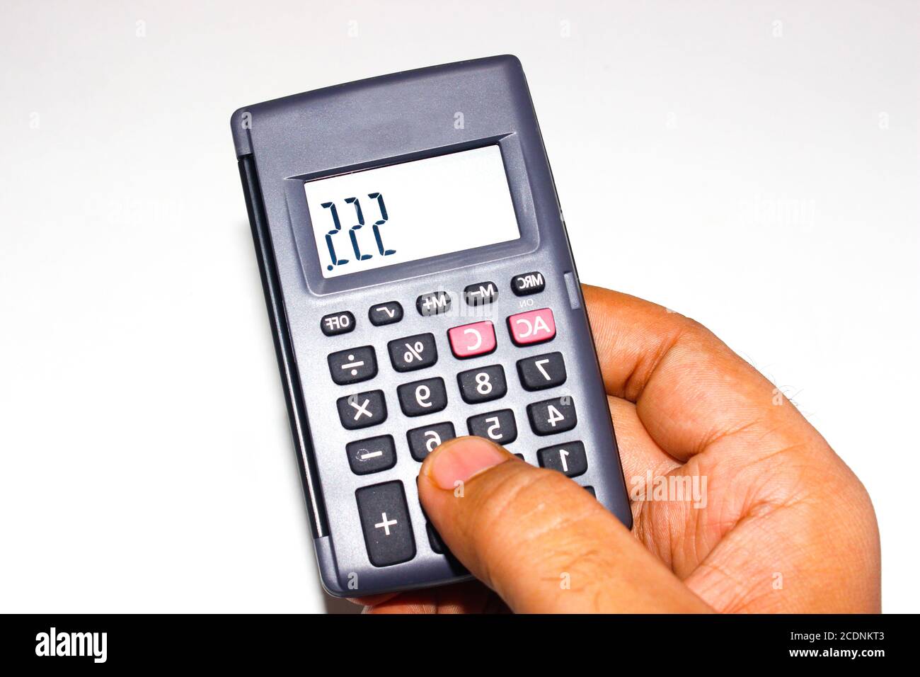 A picture of calculator on white background Stock Photo - Alamy
