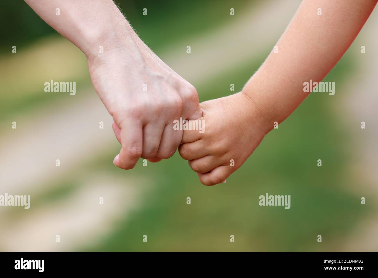 Hands gripping together hi-res stock photography and images - Alamy