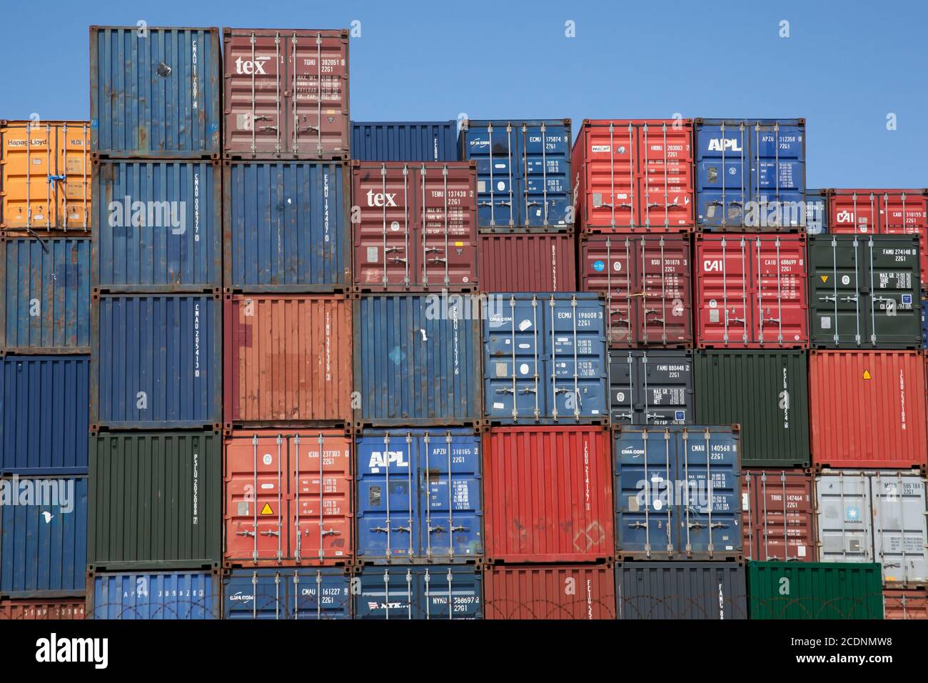 Stacked shipping containers at the docks in Southampton, Hampshire in ...