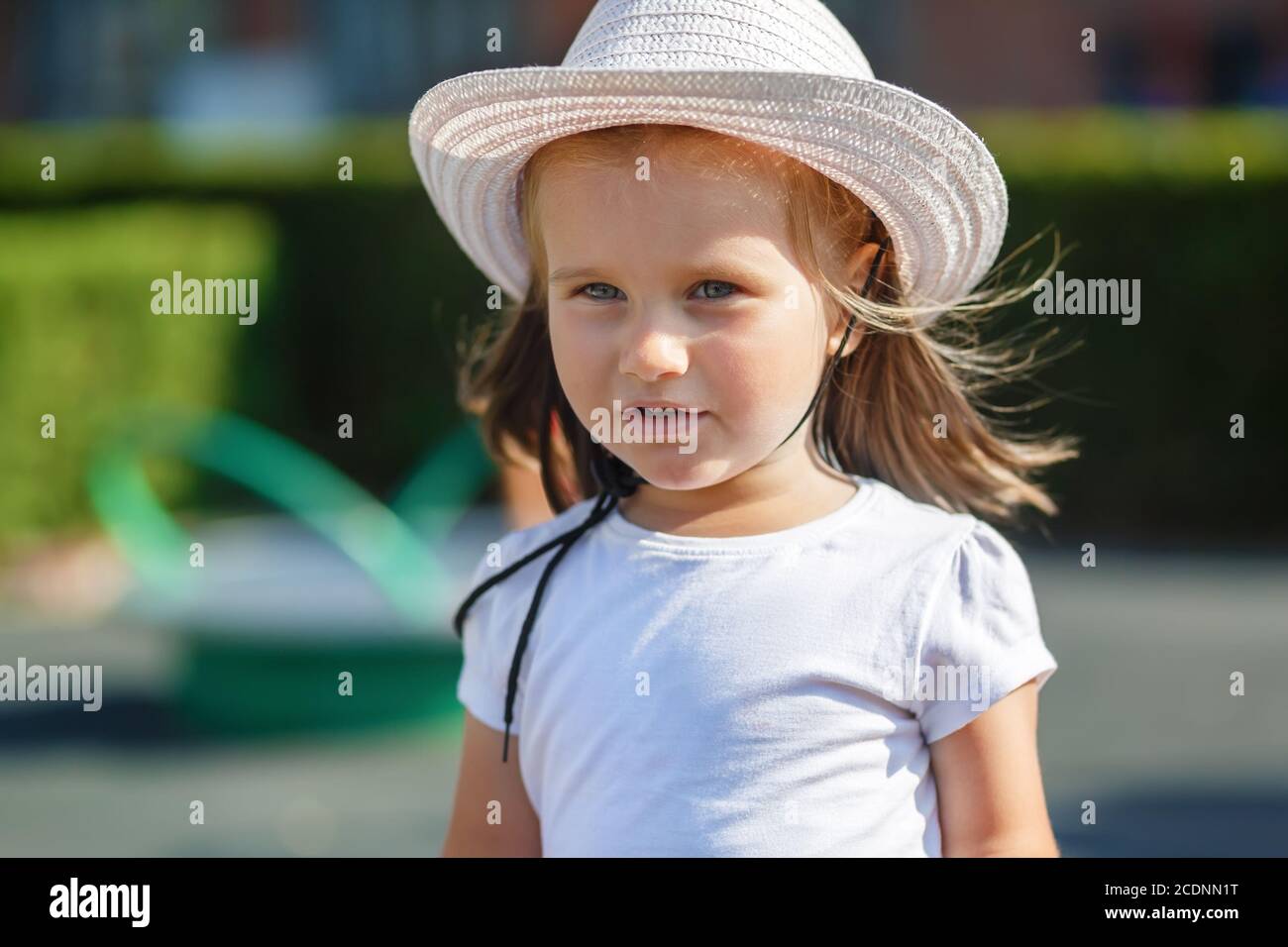 Child in white hat Stock Photo - Alamy