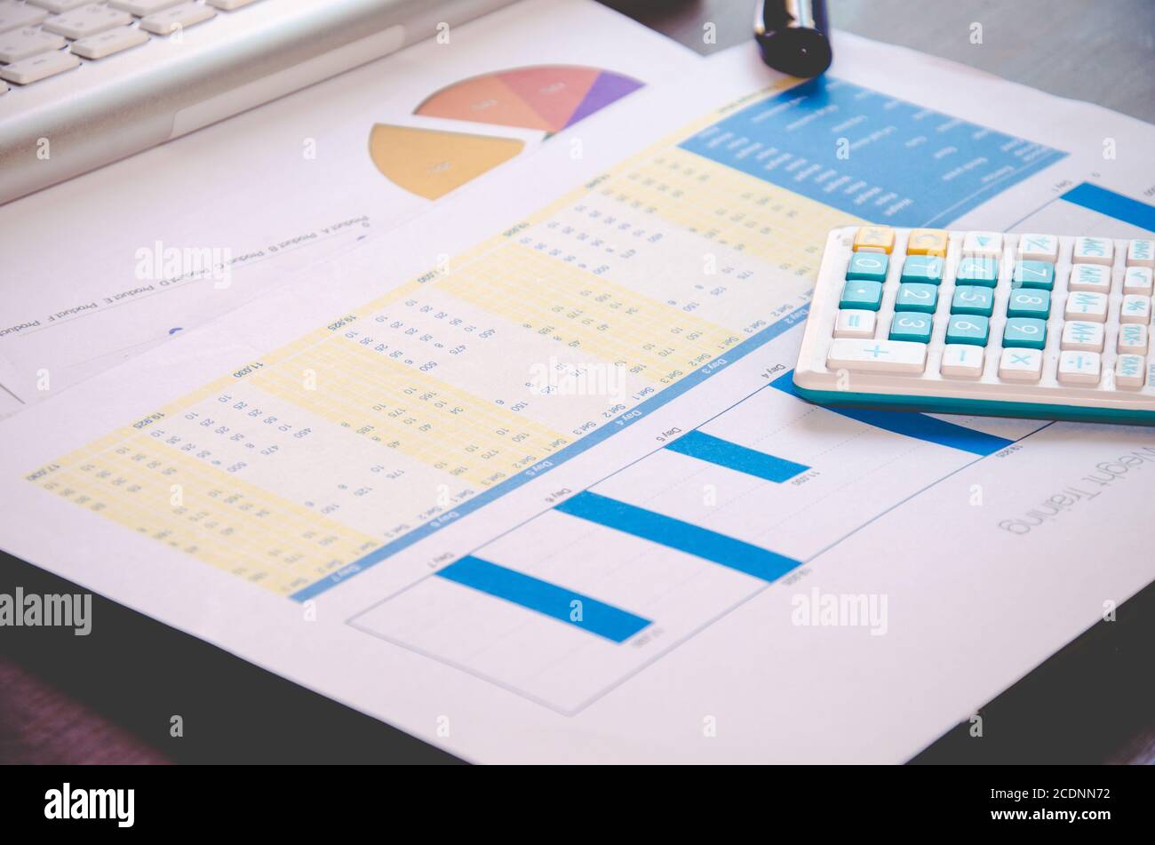 Graph and calculator Stock Photo - Alamy