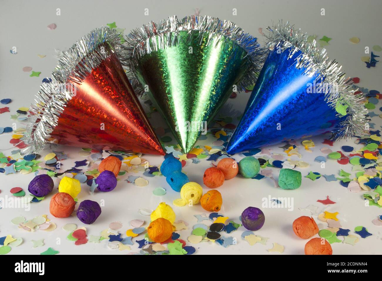 Carnival Hats and Confetti Stock Photo - Alamy