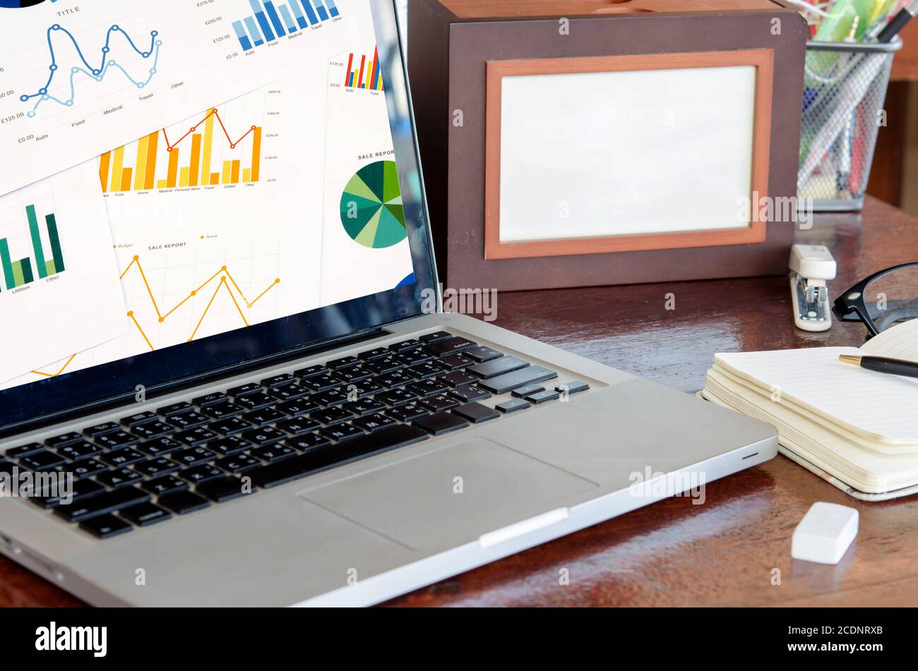 computer laptop and graph Stock Photo - Alamy
