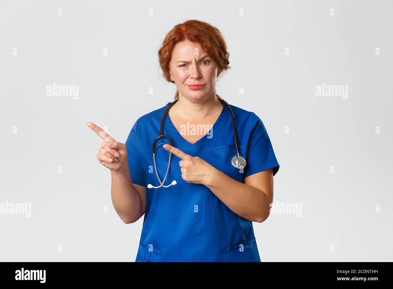 Medicine, healthcare and coronavirus concept. Doubtful and confused ...