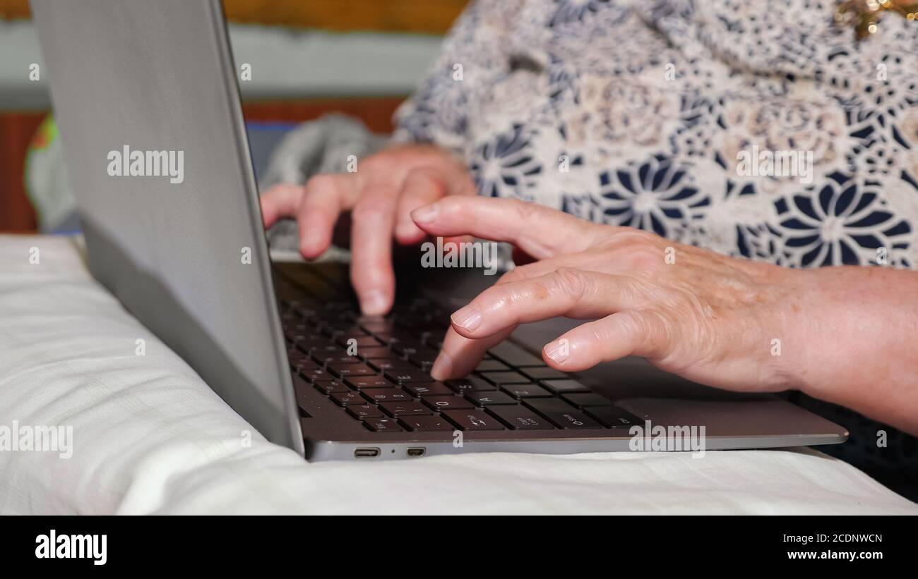 Old woman study typing hi-res stock photography and images - Alamy