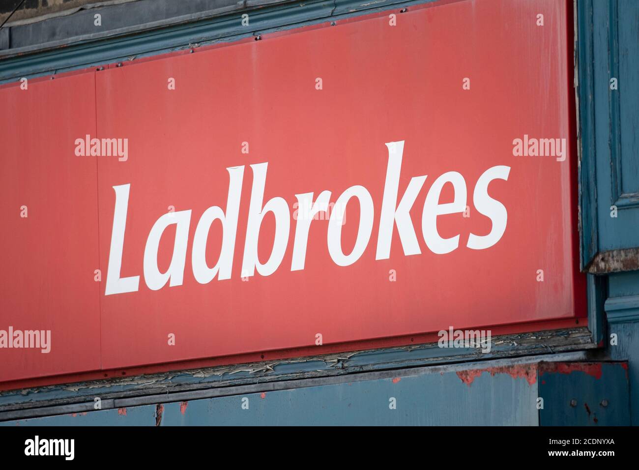 A close-up of a Ladbrokes bookies sign in Bargoed, Wales, United ...