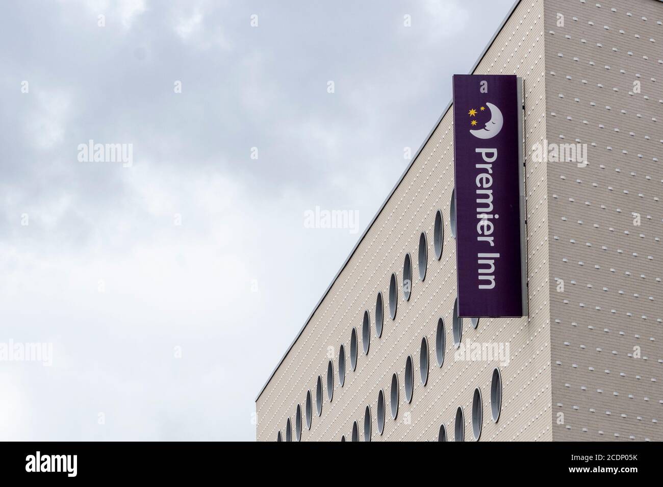 A close-up of a Premier Inn hotel sign in Cardiff, Wales, United ...