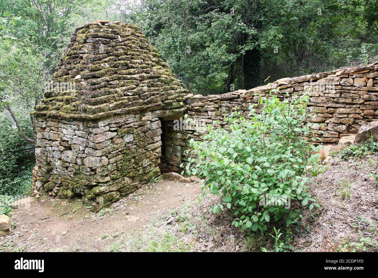 Old and typical stone hut called cadole in french language in ...