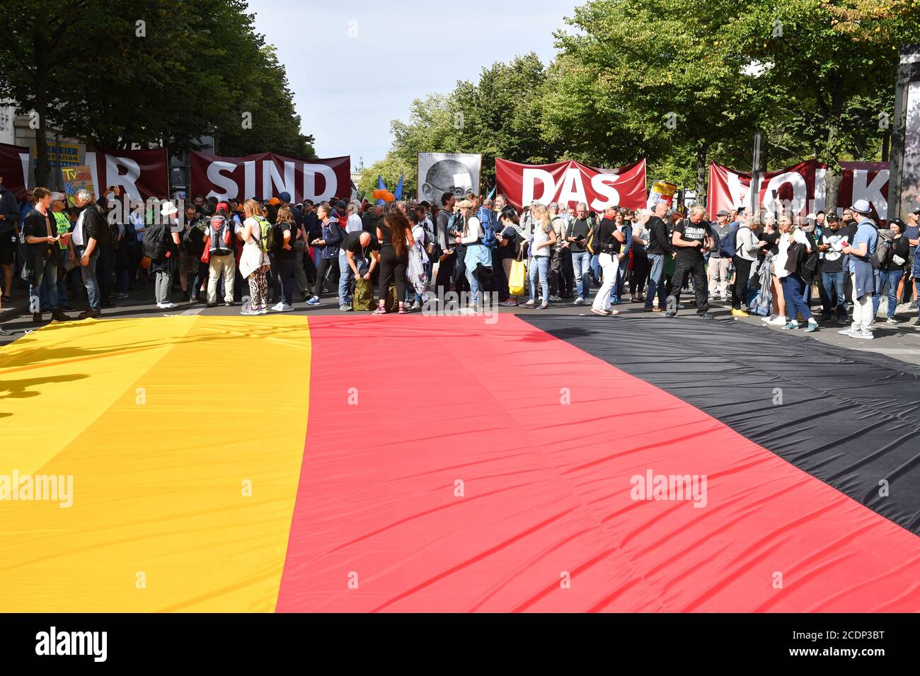 Berlin, Germany. 29th Aug, 2020. Participants gather behind a large ...