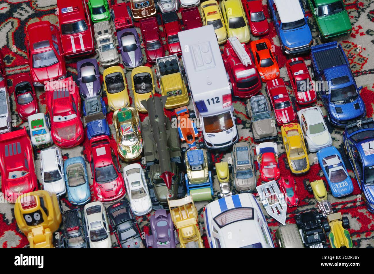 Row of toy cars hi-res stock photography and images - Alamy