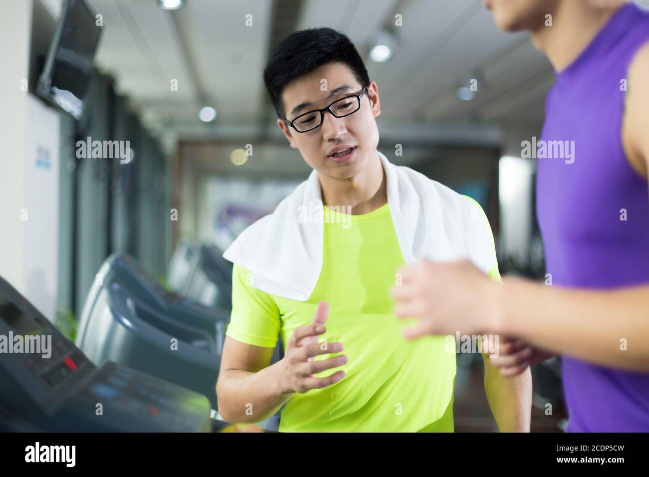 young asian people working out in modern gym Stock Photo - Alamy