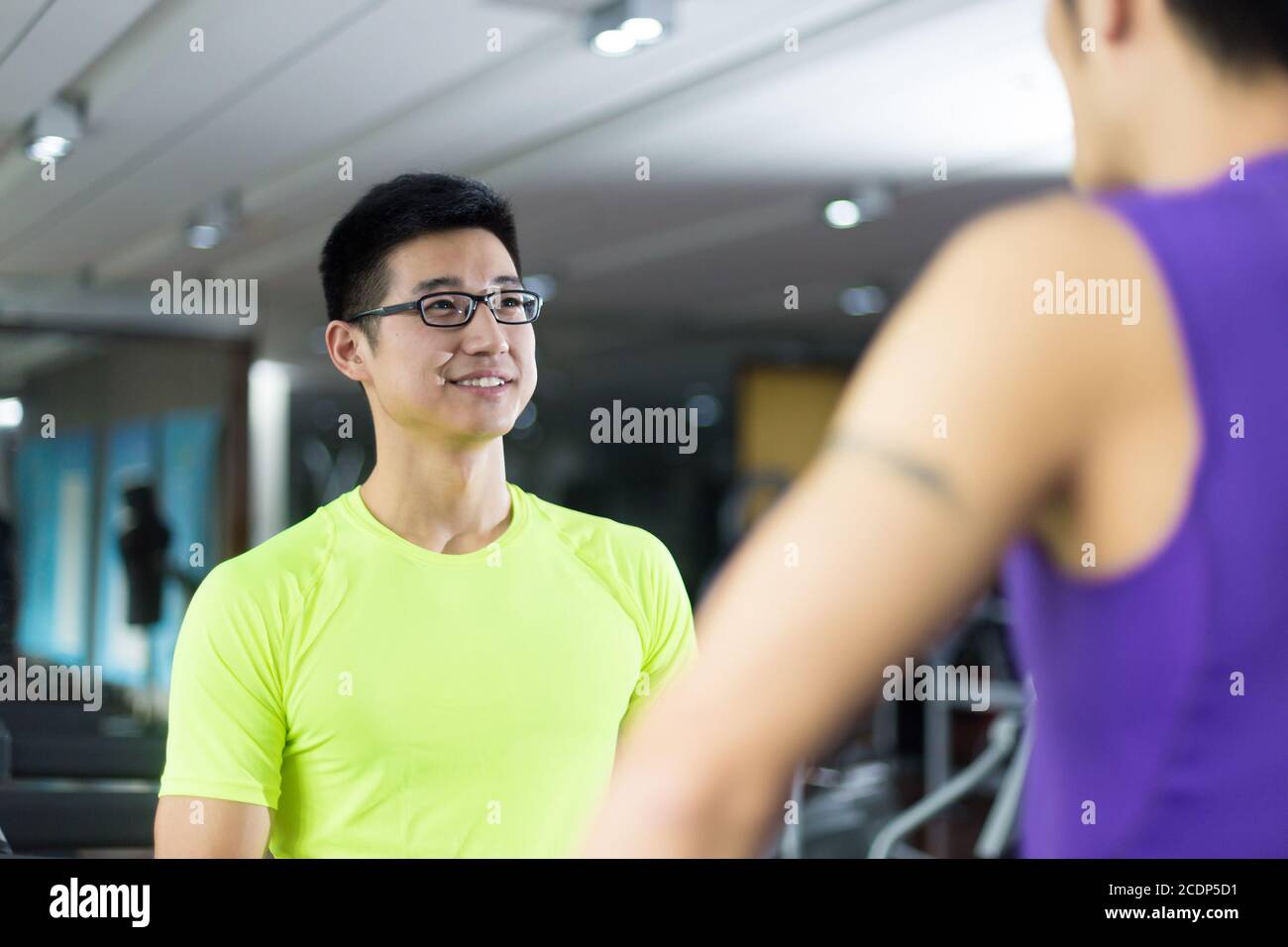 Asian people talking hi-res stock photography and images - Alamy