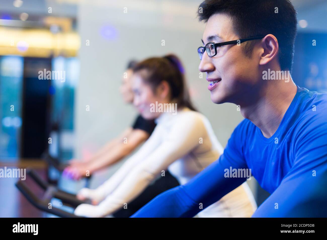 young asian people working out in modern gym Stock Photo - Alamy