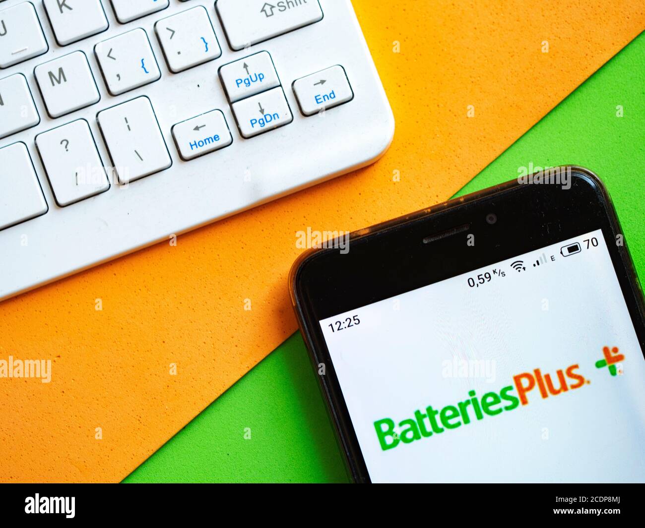 In this photo illustration e-commerce a Batteries Plus logo is seen ...
