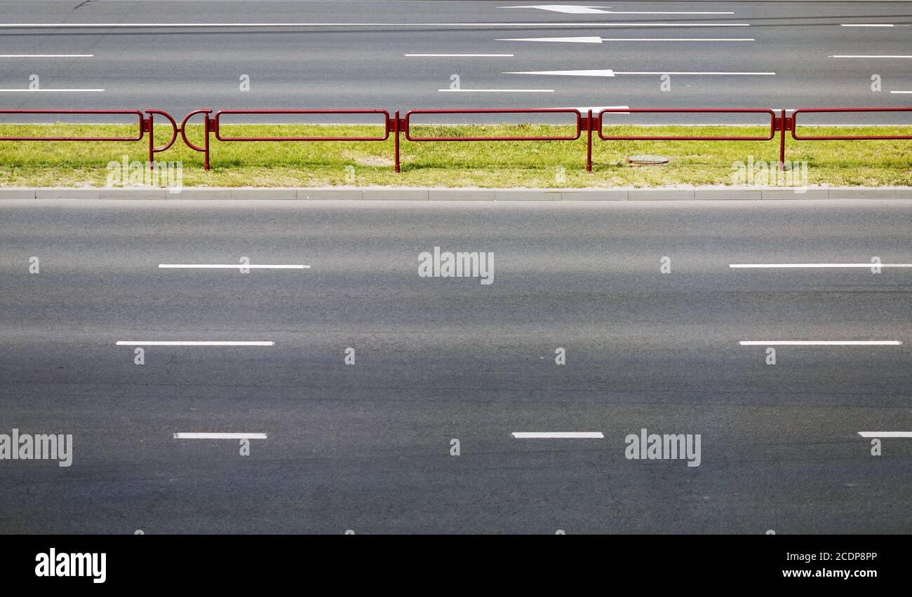 Asphalt road with stripes Stock Photo - Alamy