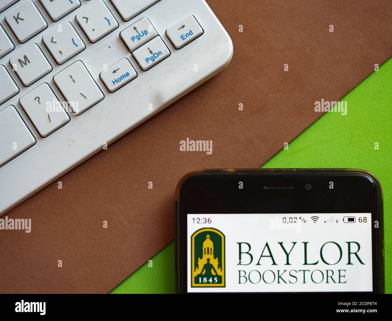 In this photo illustration e-commerce a Baylor Bookshore logo is seen ...
