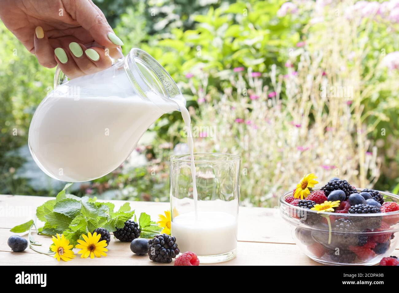 Milk pouring table hi-res stock photography and images - Alamy