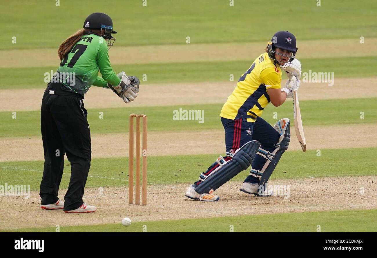 South East Star's Hannah Jones hits out during the Rachael Heyhoe-Flint ...