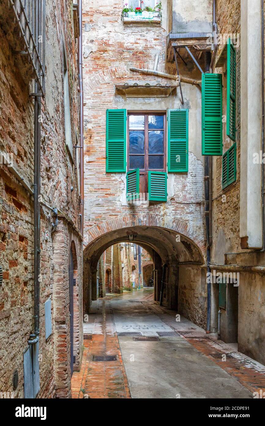 Italian back street in a city Stock Photo - Alamy