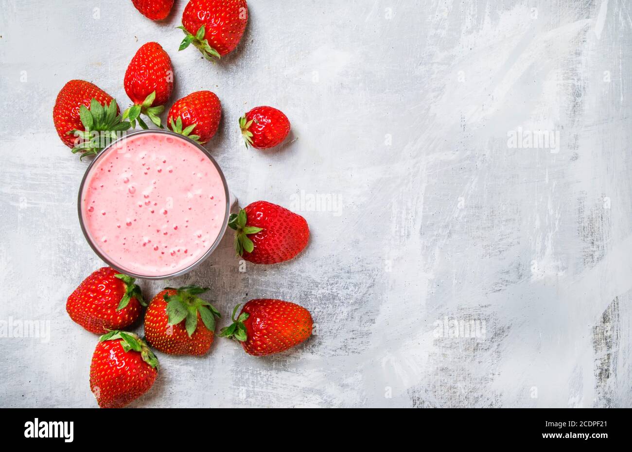 Strawberry milkshake with berries, food background, top view Stock ...