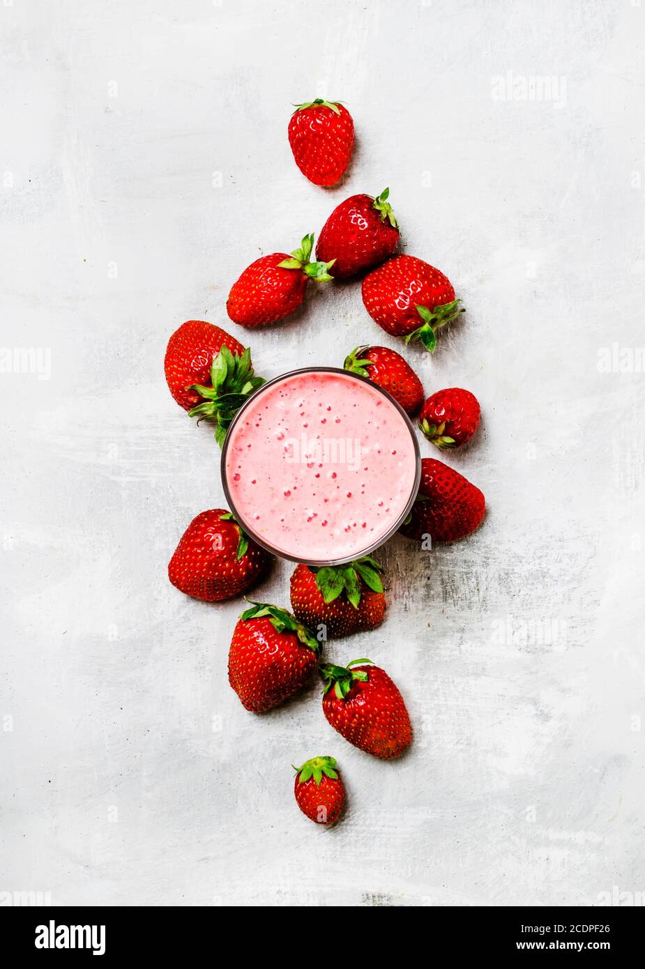 Strawberry milkshake with berries, food background, top view Stock ...