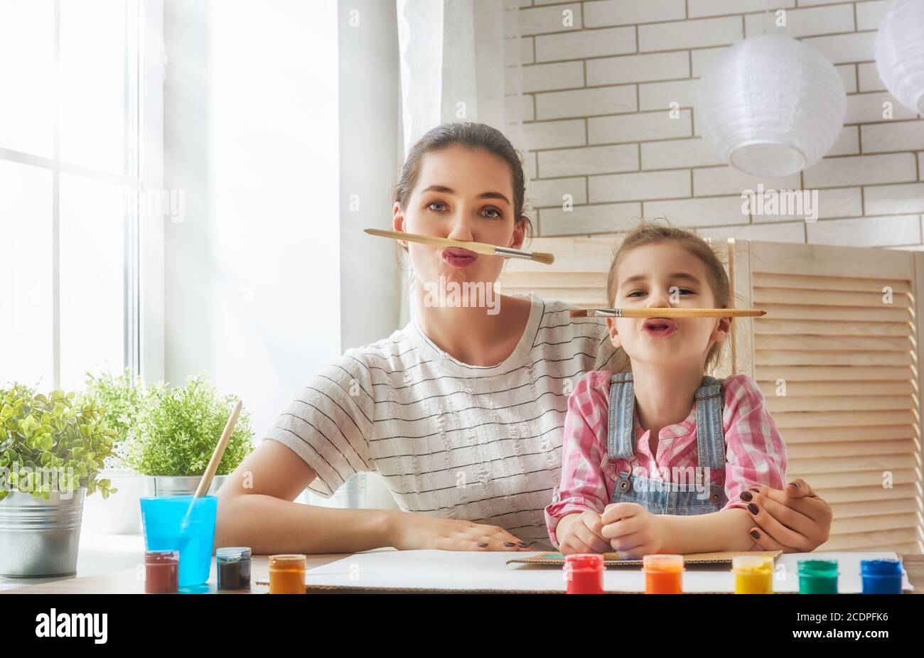 Two young fooling around together hi-res stock photography and images ...