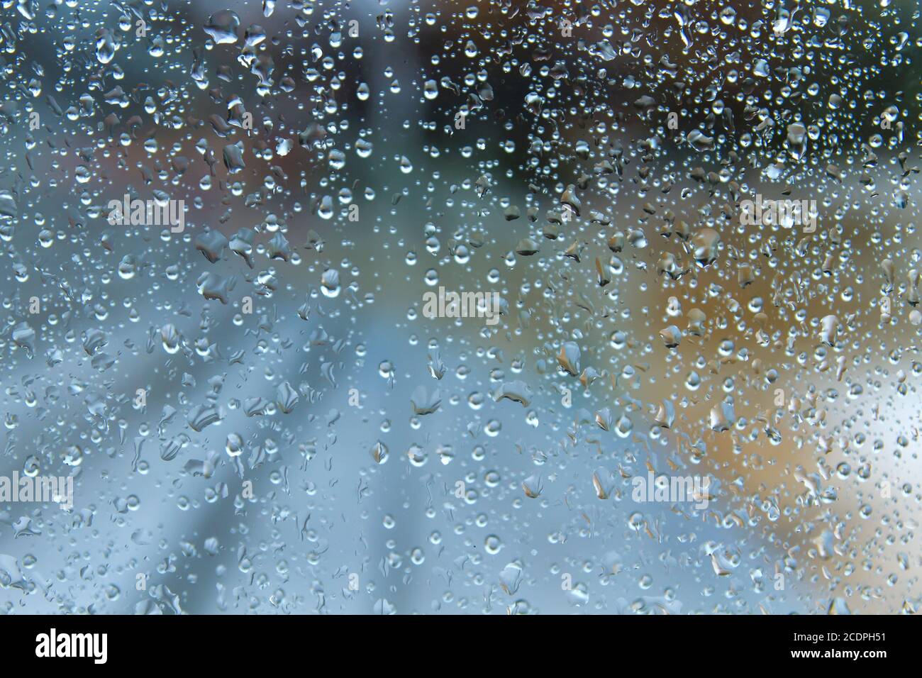 Rain droplets on a window Stock Photo - Alamy