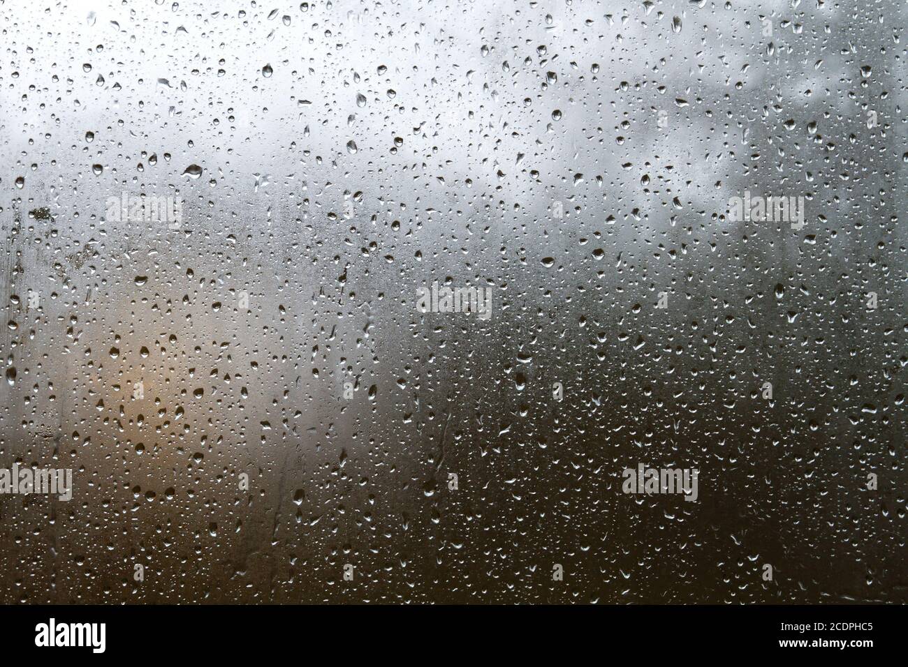 Rain droplets on a window Stock Photo - Alamy