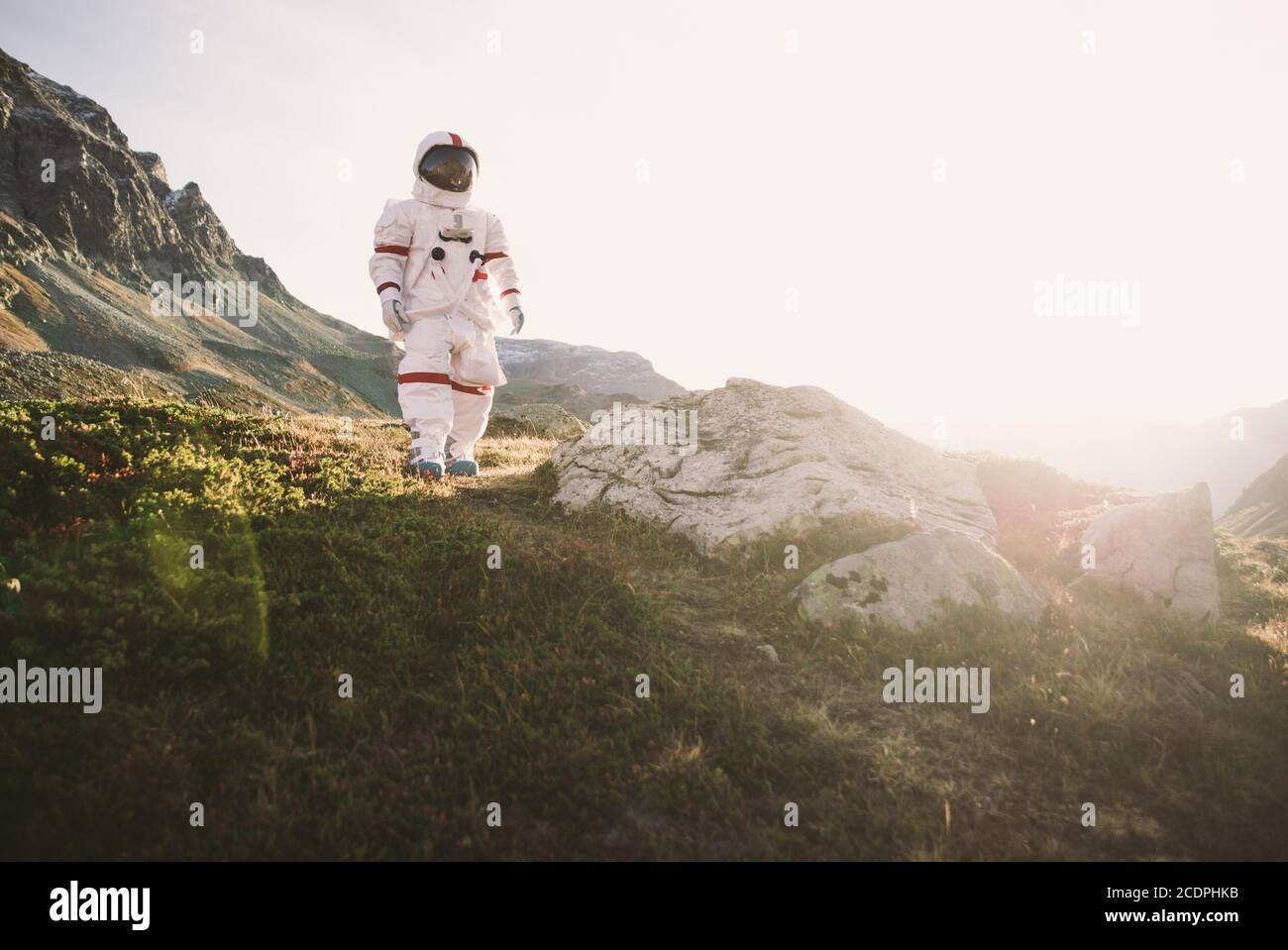 Astronaut exploring a new planet. Searching for a new home for humanity ...