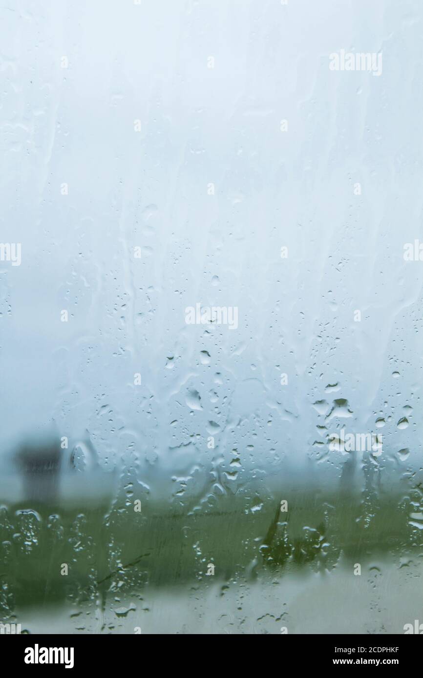 Rain droplets on a window Stock Photo - Alamy