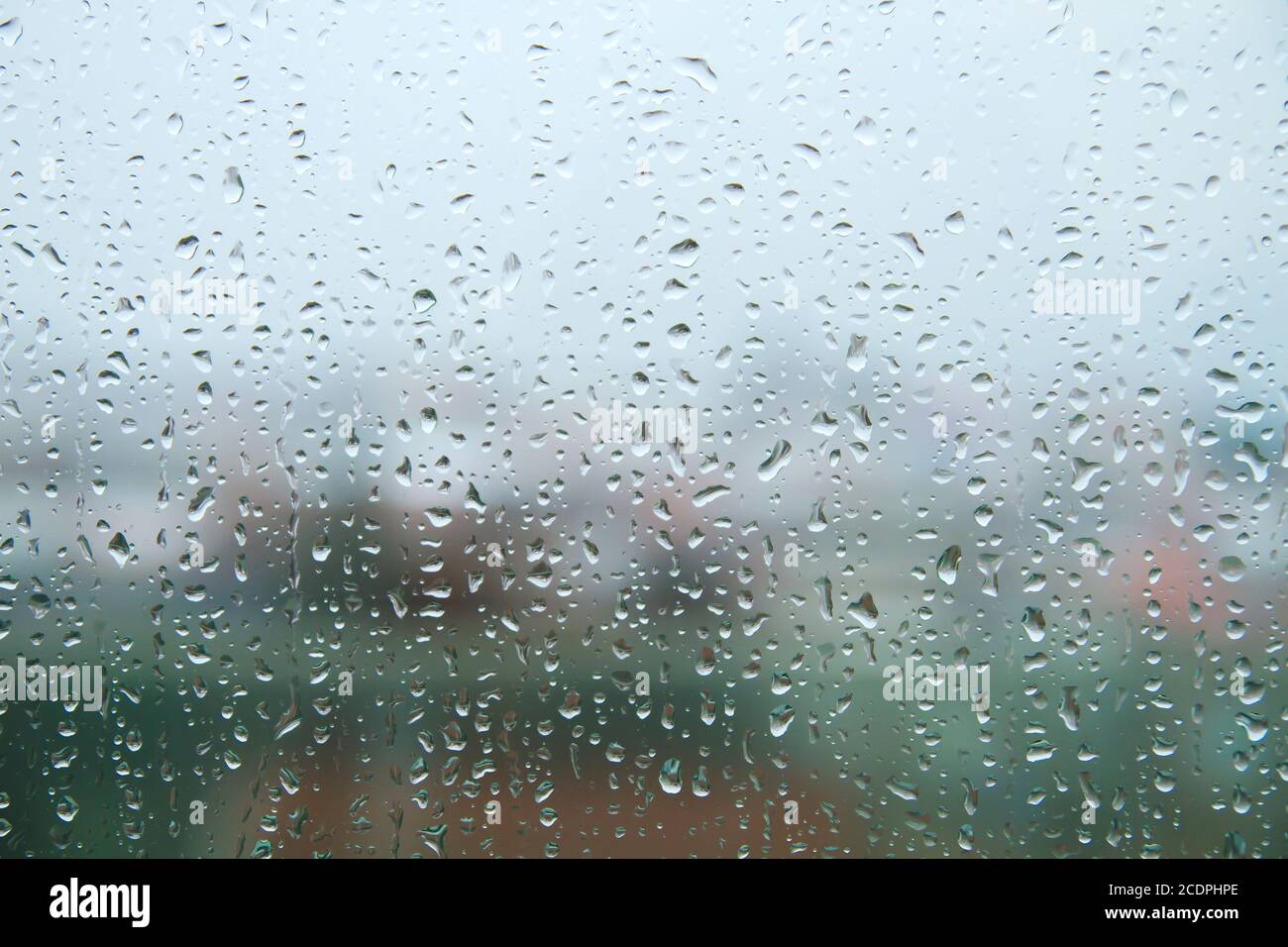 Rain droplets on a window Stock Photo - Alamy