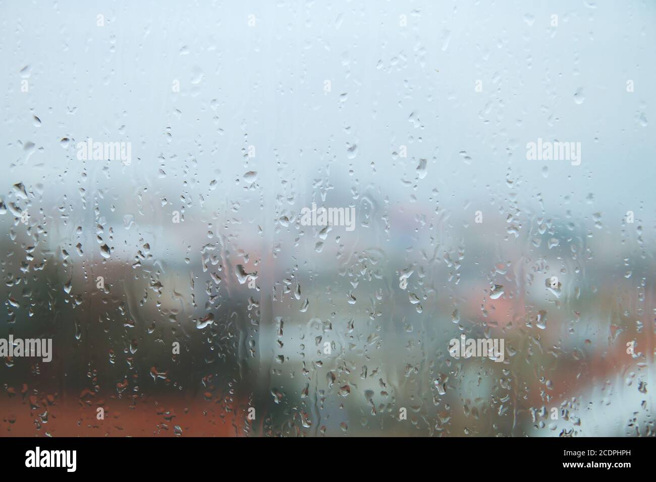 Rain droplets on a window Stock Photo - Alamy