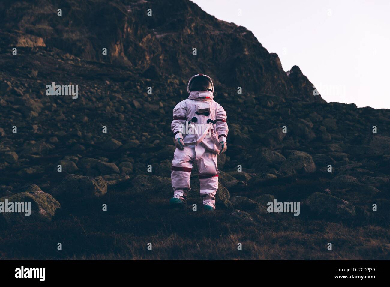 Astronaut exploring a new planet. Searching for a new home for humanity ...