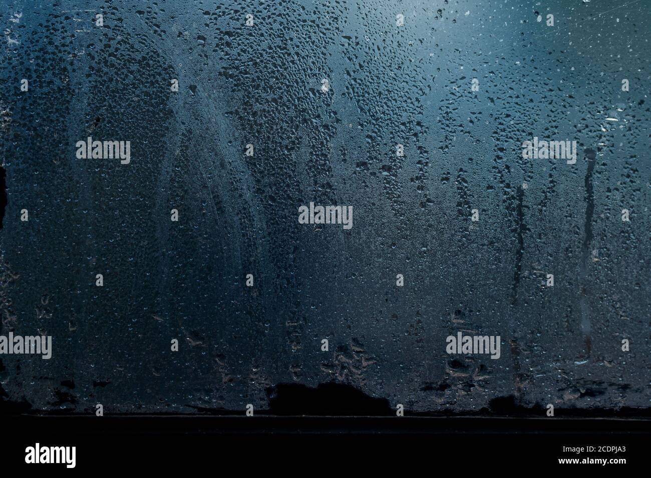 Rain droplets on a window Stock Photo - Alamy