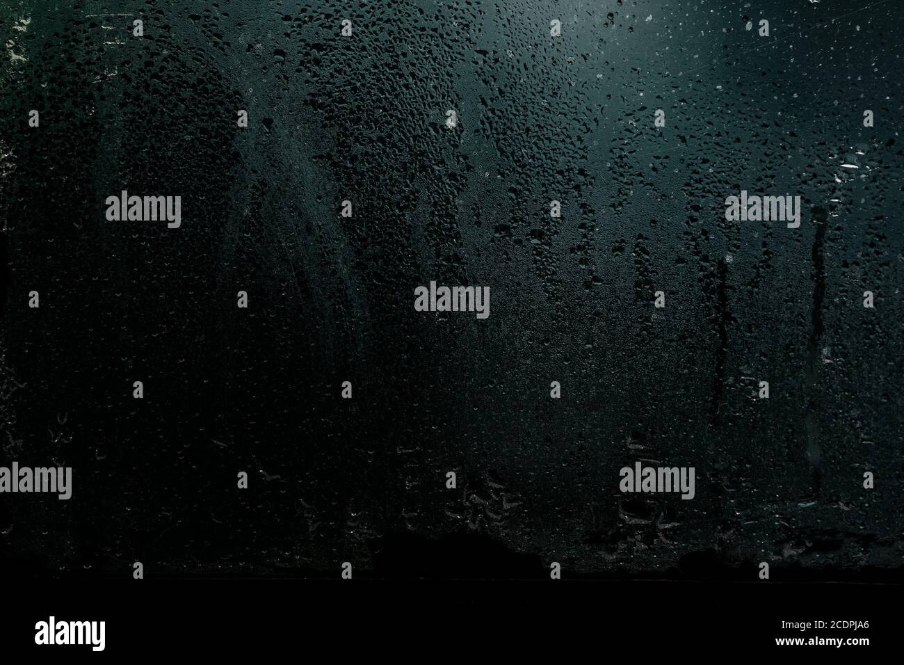 Rain droplets on a window Stock Photo - Alamy