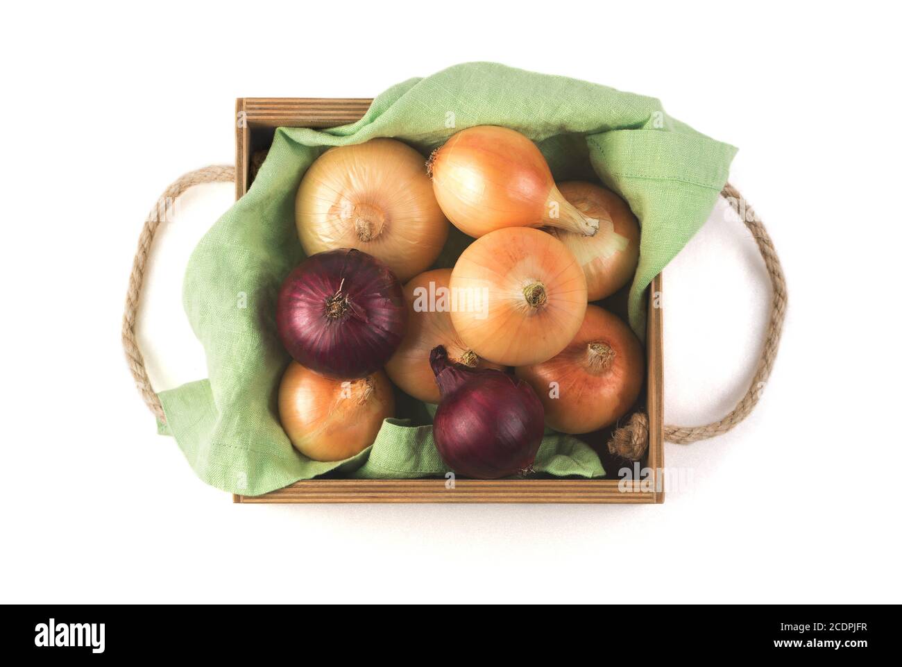 Onions of different varieties in a beautiful wooden packing box on a ...