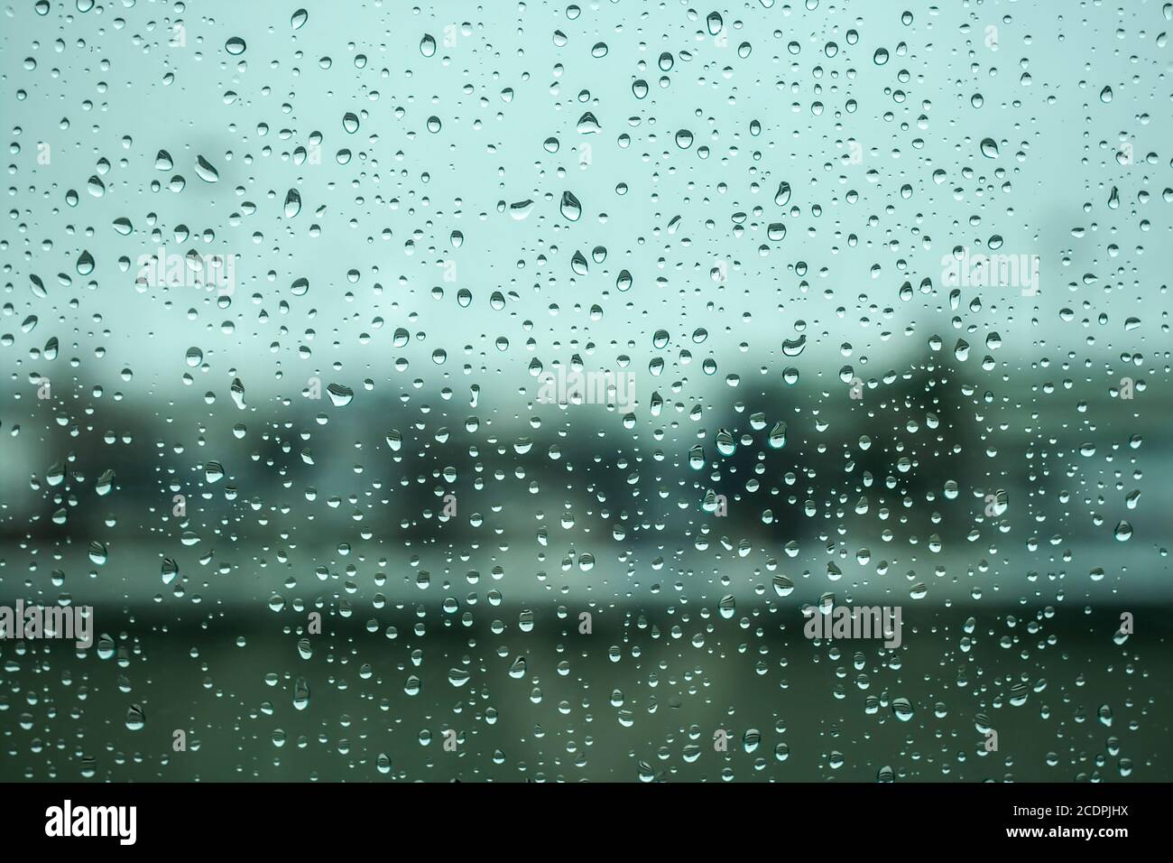 Rain droplets on a window Stock Photo - Alamy