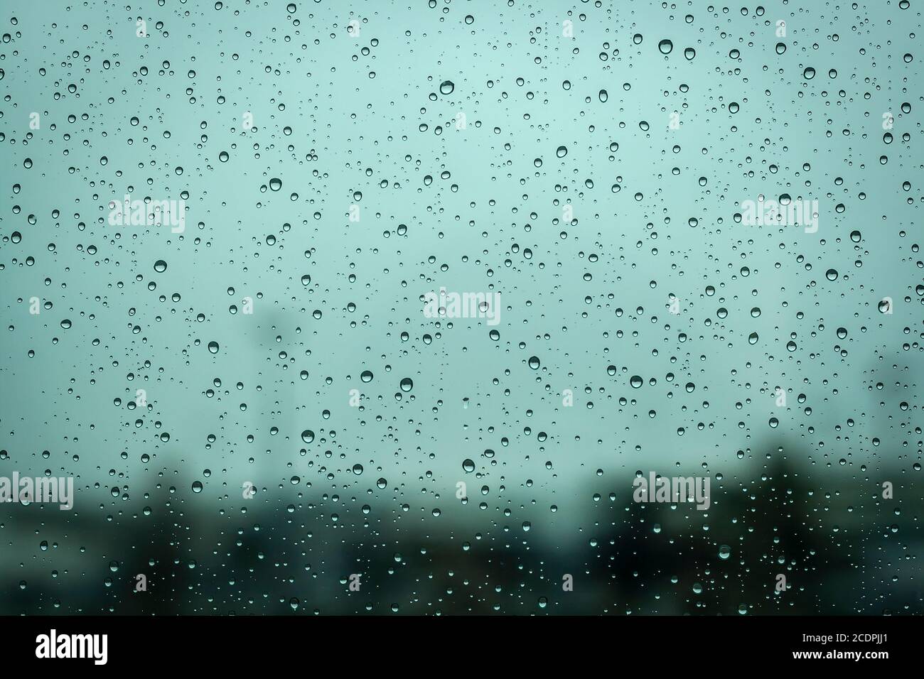 Rain droplets on a window Stock Photo - Alamy