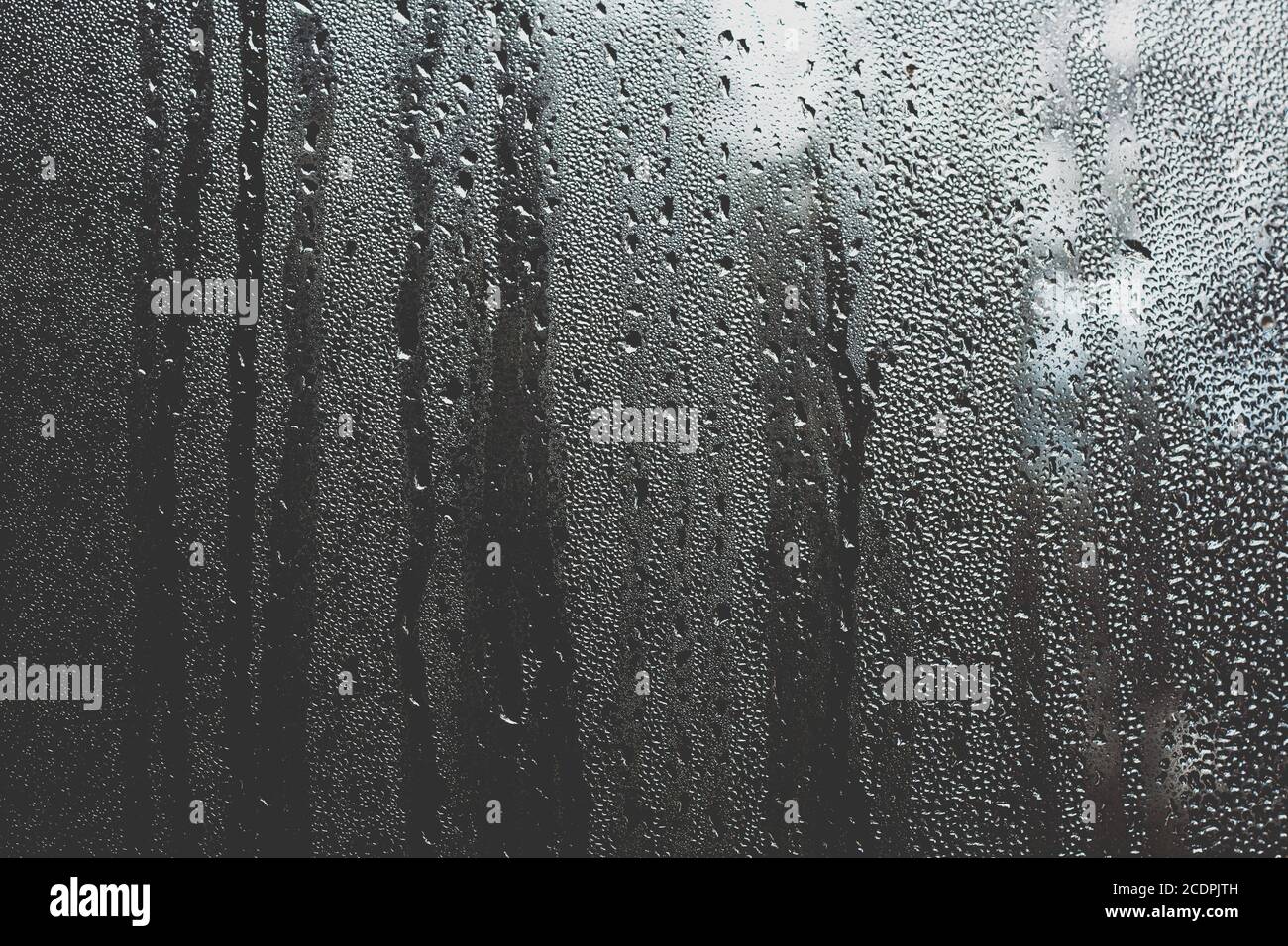 Rain droplets on a window Stock Photo - Alamy