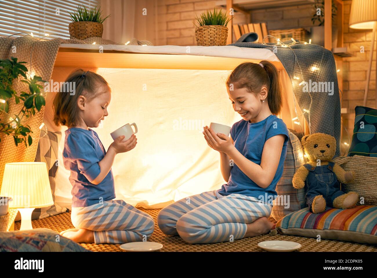 Two girls having tea hi-res stock photography and images - Alamy