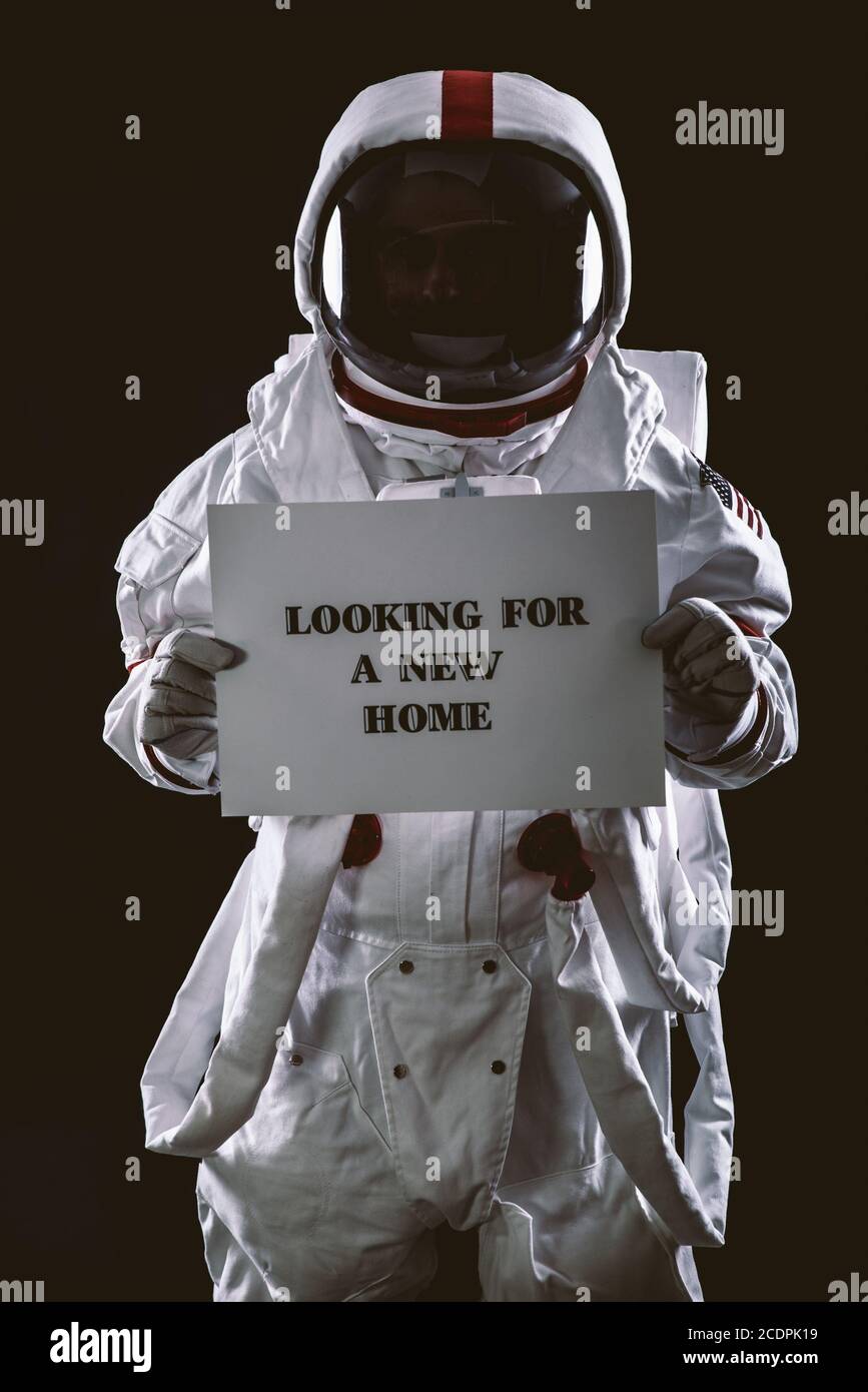 Astronaut leaving earth. Searching for a new home for humanity. Concept about science and nature ...
