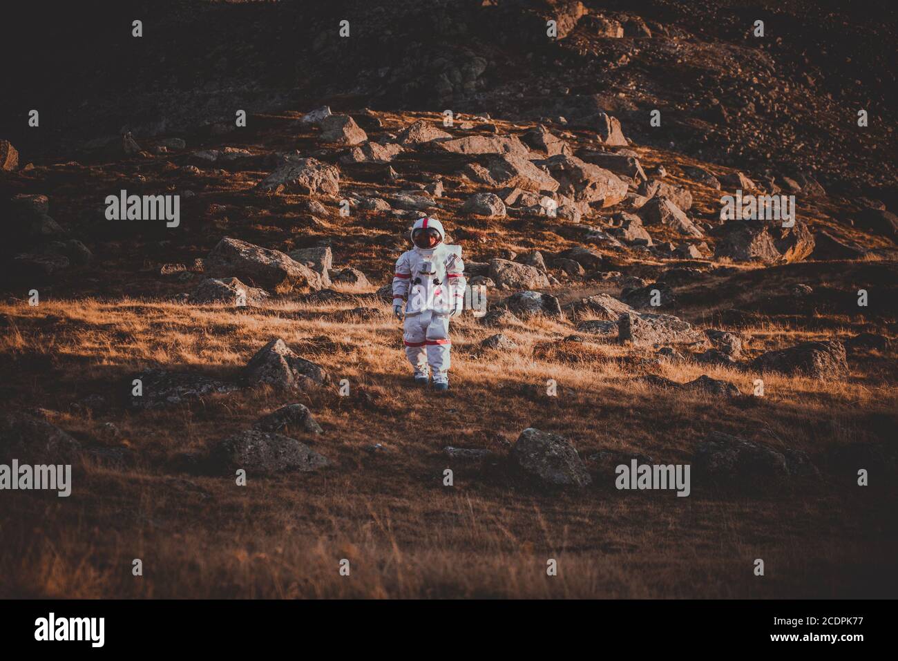 Astronaut exploring a new planet. Searching for a new home for humanity ...